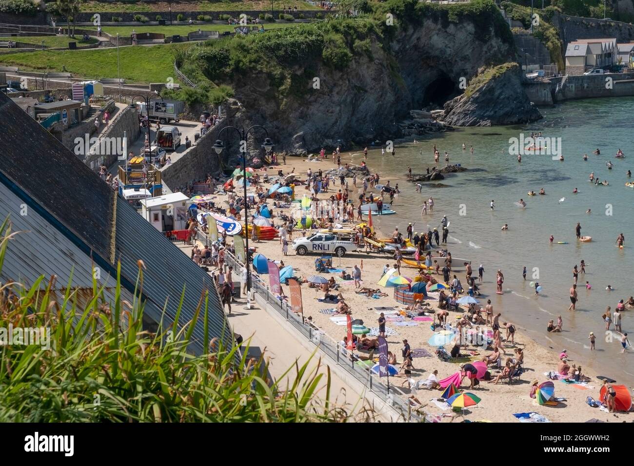 Crowded beach in summer parasols umbrellas hi-res stock photography and ...