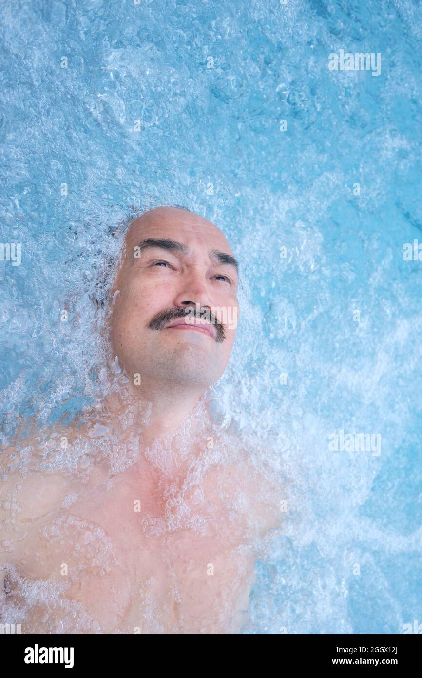 Person laying by the pool hi-res stock photography and images - Alamy