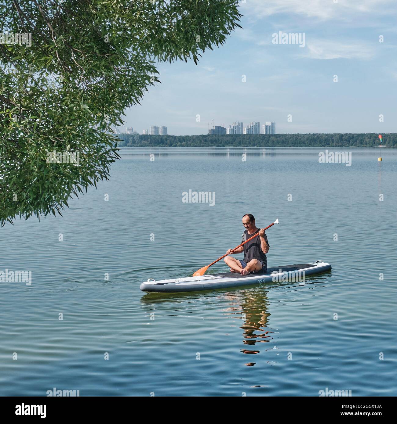 Man on sup board hi-res stock photography and images - Alamy
