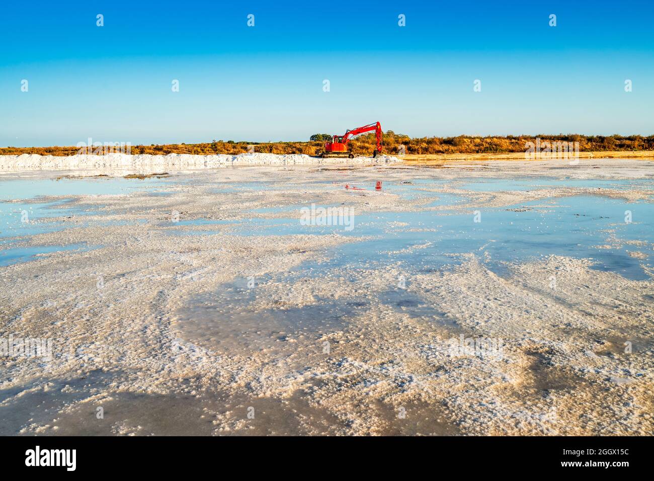 A pond full of salt after evaporation of ocean water at salines in Faro ...