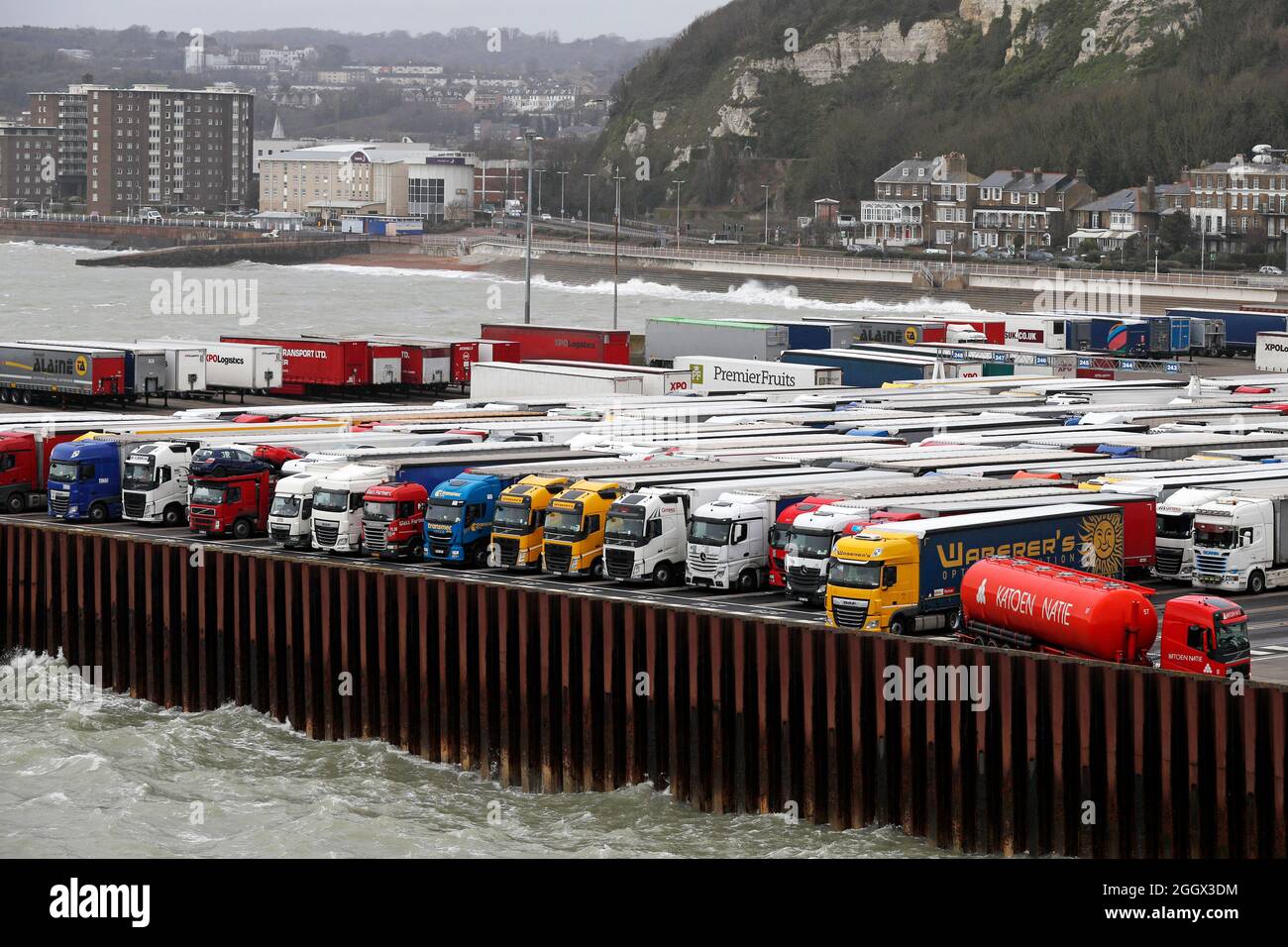 Trucks are seen parked ready to board a ferry at the Port of Dover in ...