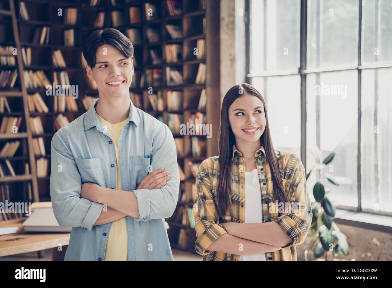Photo of two cheerful smiling thoughtful confident university students ...