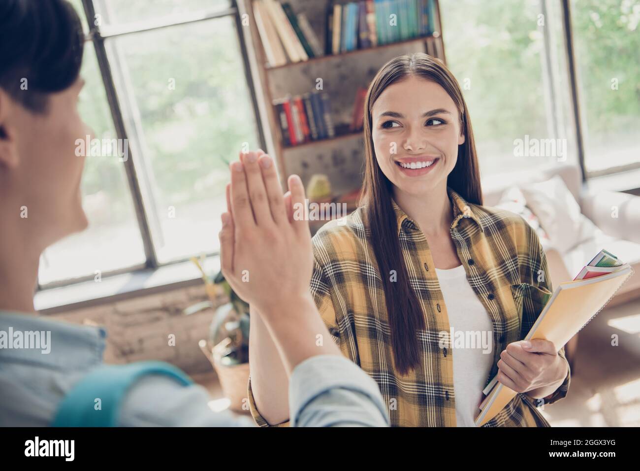 Portrait of two best friends classmates giving high five success ...