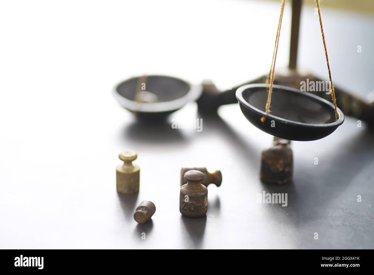 Tiny weights vintage balance scales. Detail of Ancient old scale ...