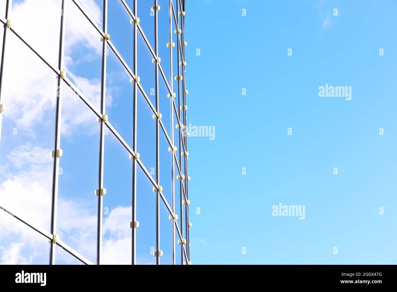 Architectural detail of the facade with multiple reflections of other ...