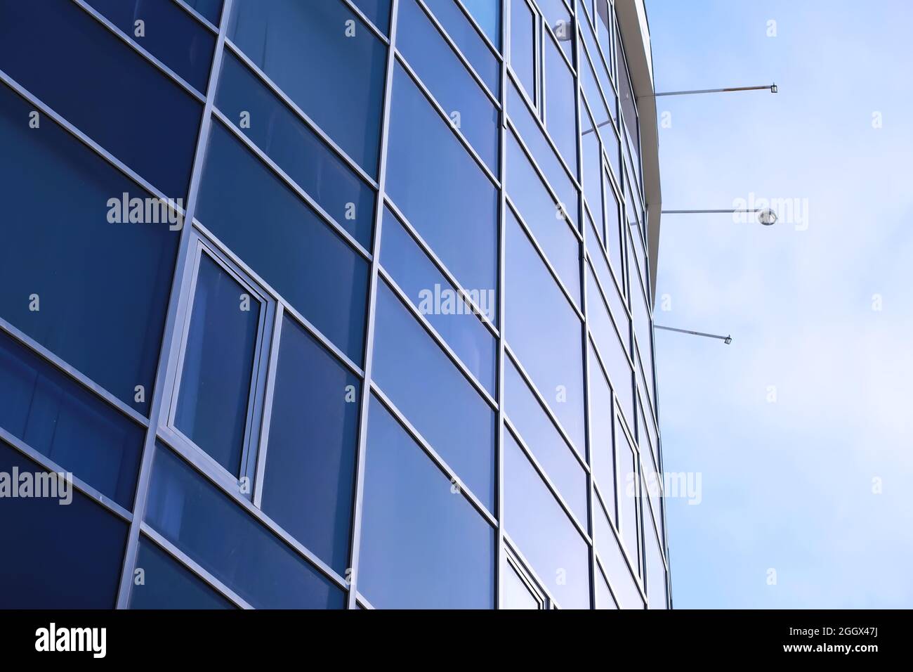 Architectural detail of the facade with multiple reflections of other ...