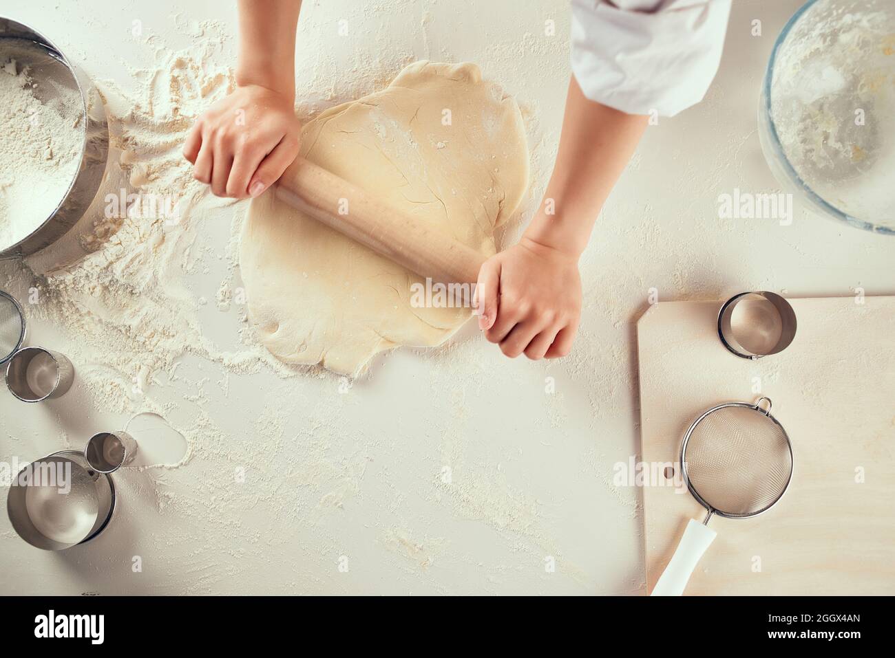 rolling dough on the table flour products kitchen work Stock Photo - Alamy