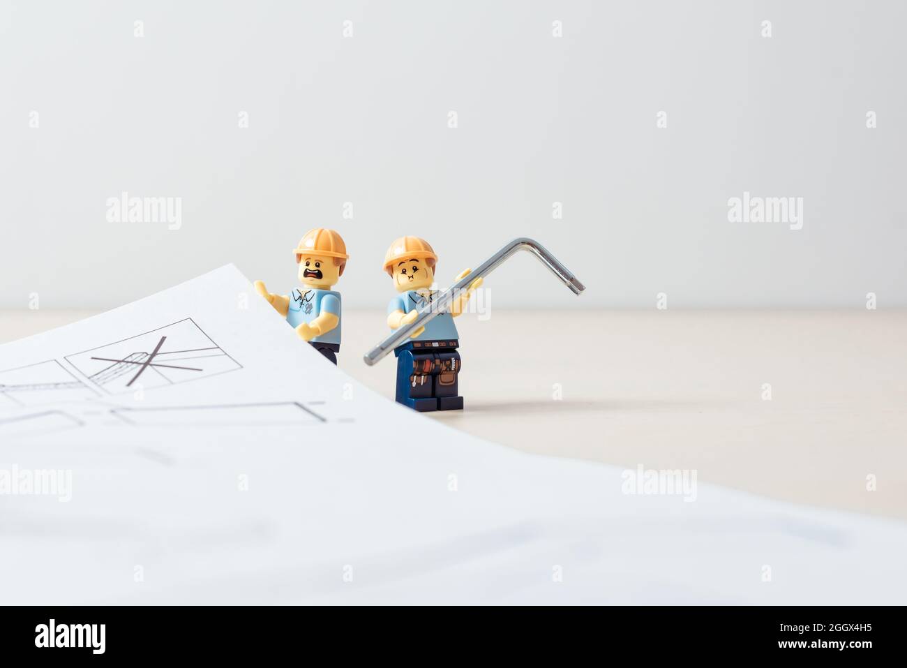 Construction work with tools and instruction manual. Illustrative ...