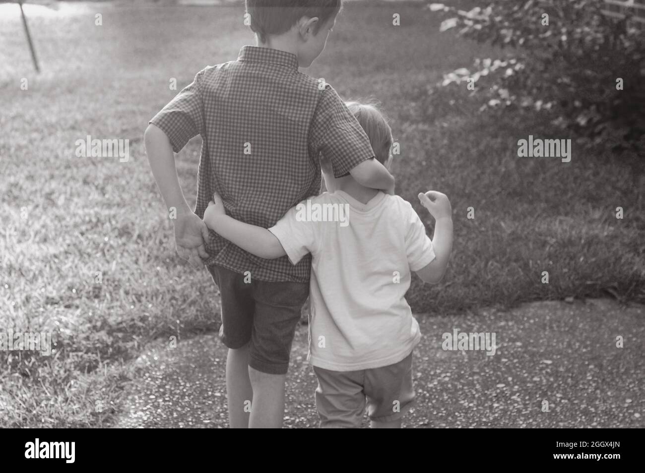 brotherly love, brothers, walking, hugs Stock Photo - Alamy
