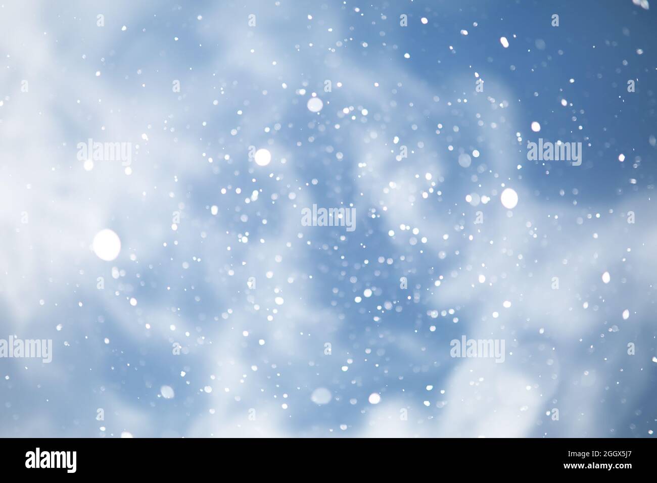 blue snowfall bokeh background, abstract snowflake background blurred abstract blue Stock Photo ...