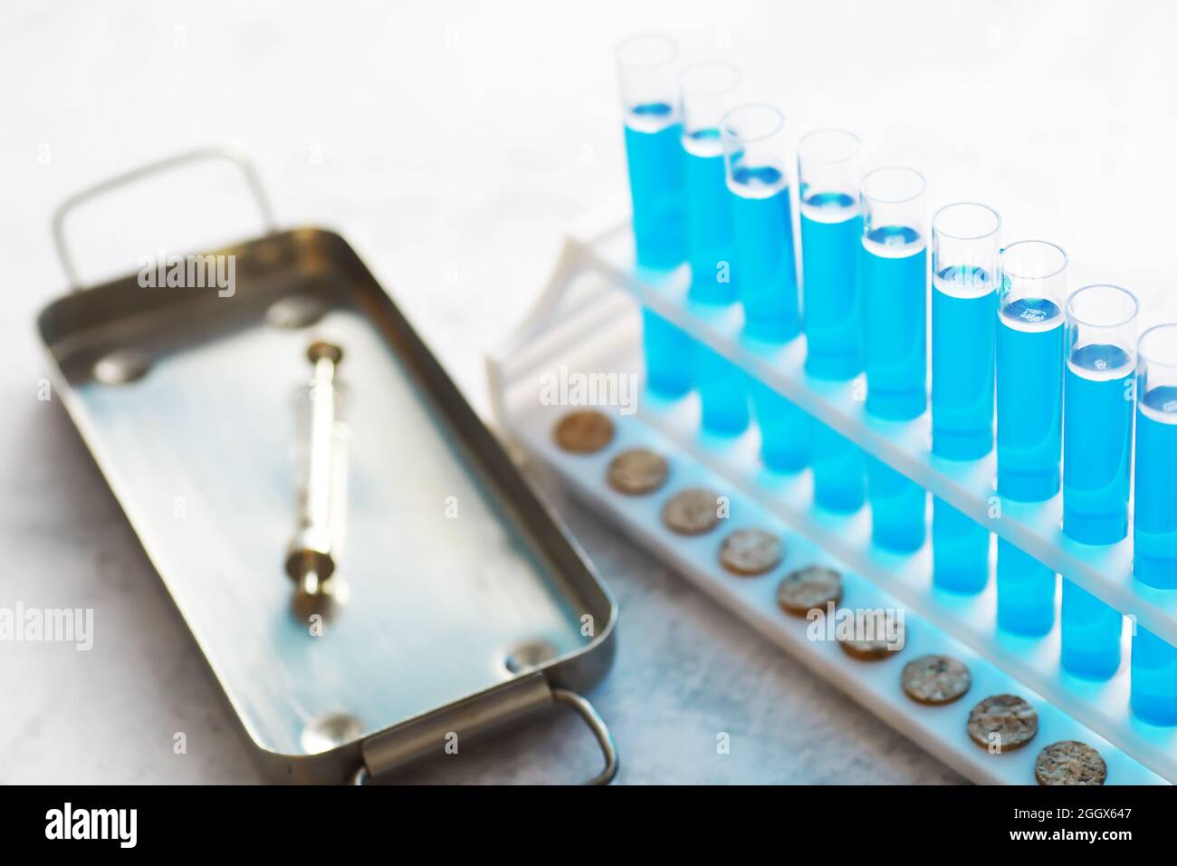 Test tube of glass overflows new liquid solution potassium blue ...