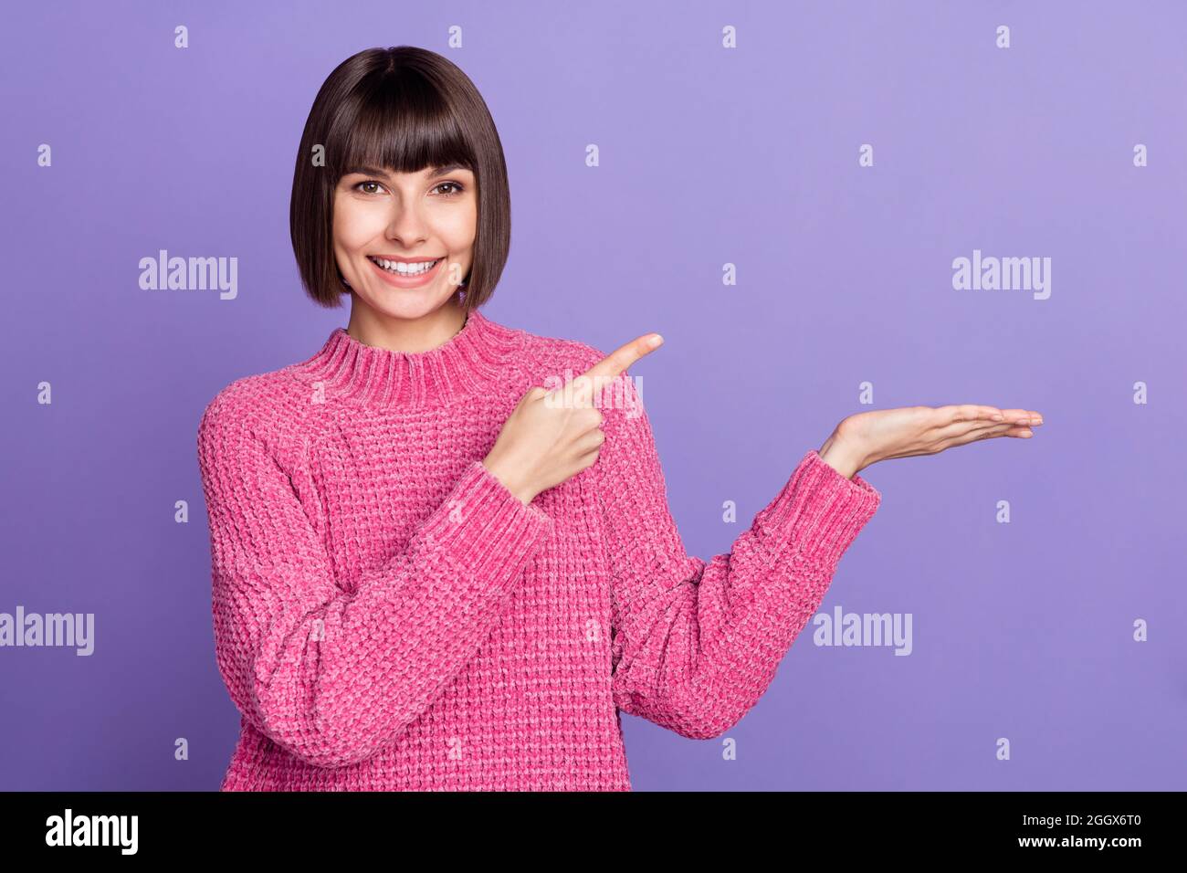 Photo of good mood cheerful young woman advertising product recommend ...