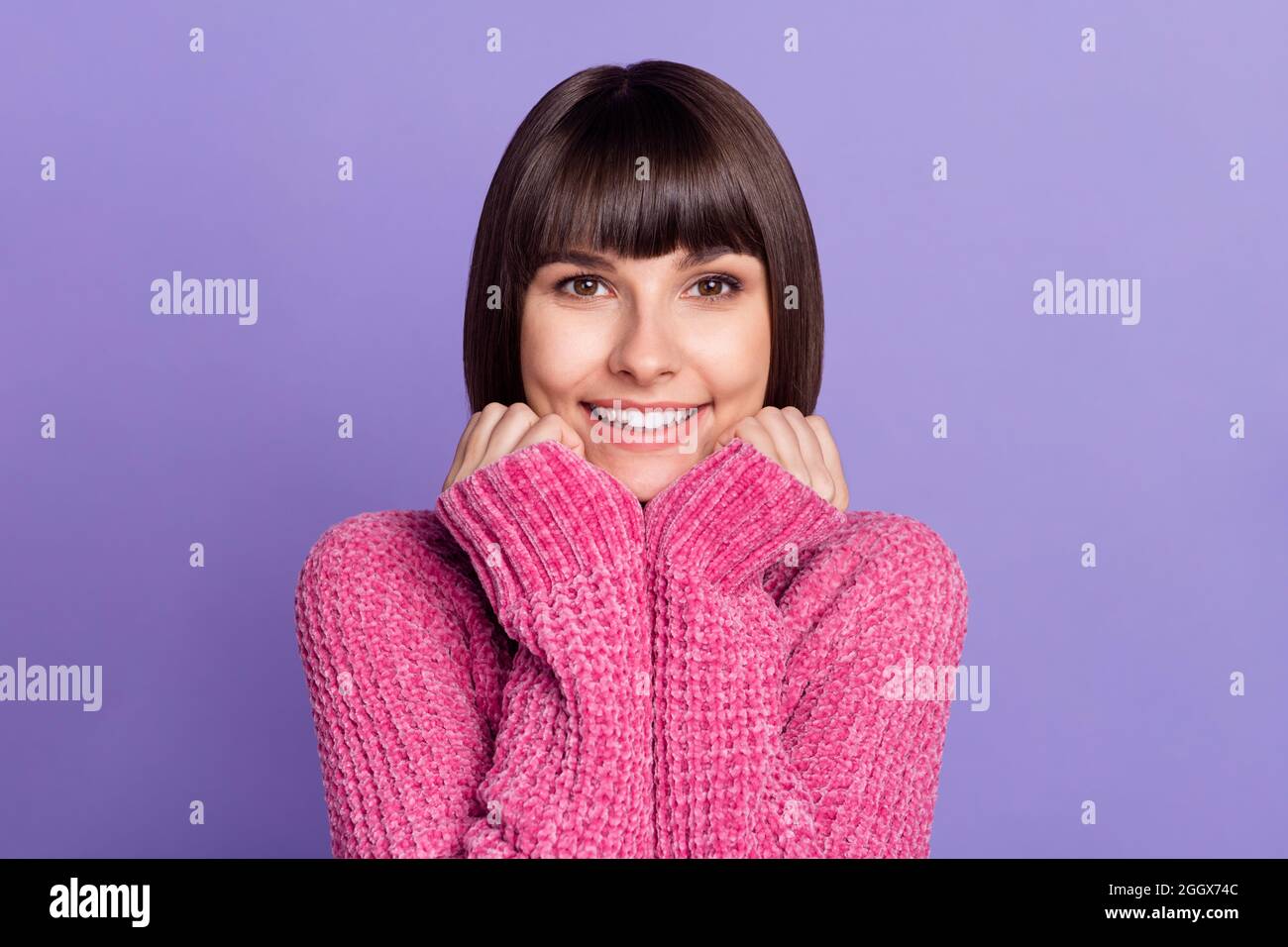 Portrait of young good mood smiling female wear warm knitted pink ...