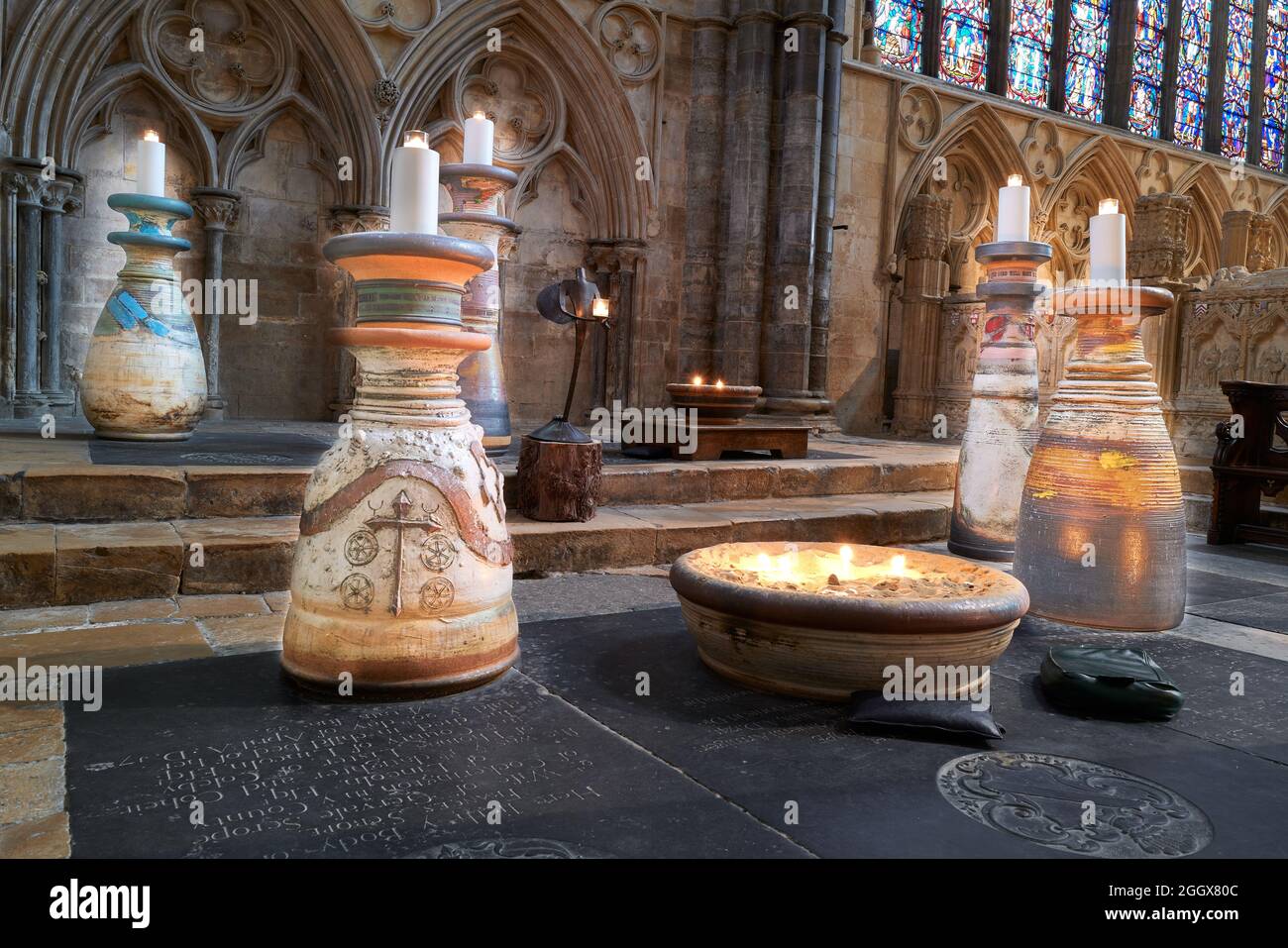 Giant candle holders (Gilbert pots) in a side chapel at the east end of ...