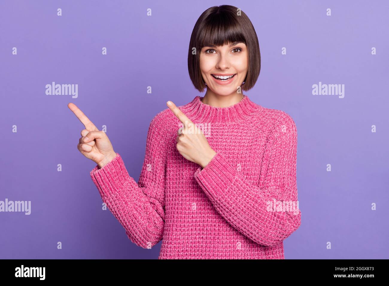 Photo of smiling good mood stunning female point fingers copyspace ...