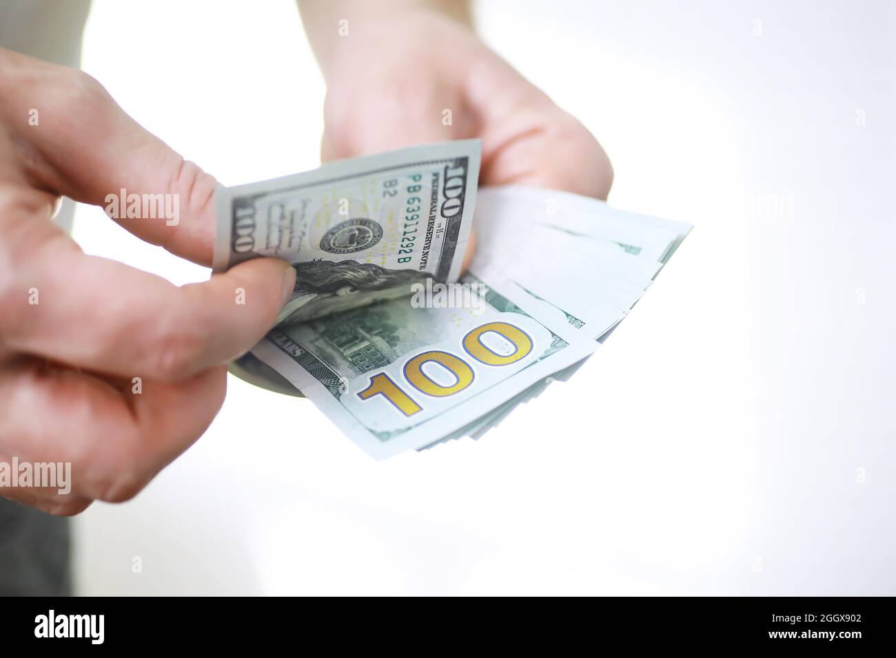 Cash money in a large pile as a finance background. Paper money close ...