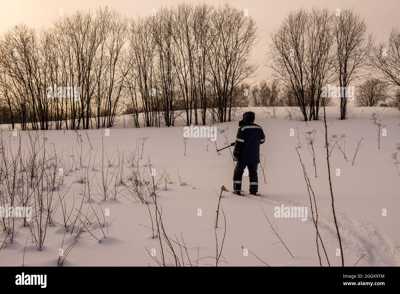 overnight stay in the snowa hunter on skis with an automatic gun in his ...