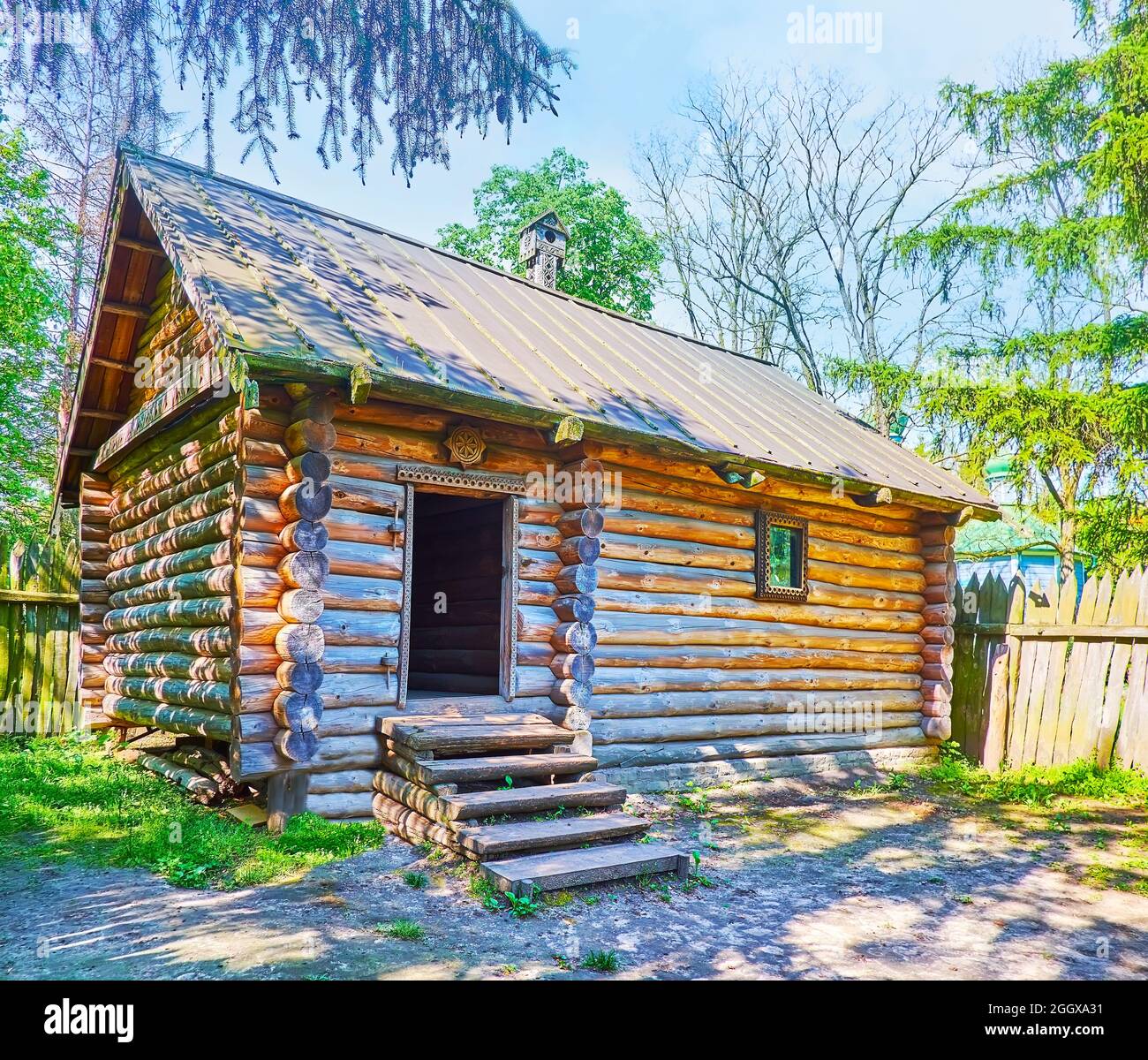 The ancient Slavic house, made of timber and decorated with modest ...