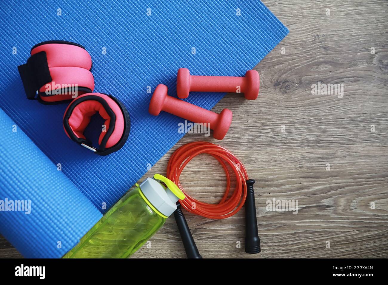 Sport and healthy lifestyle. Accessories for sports. Yoga mat dumbbell ...