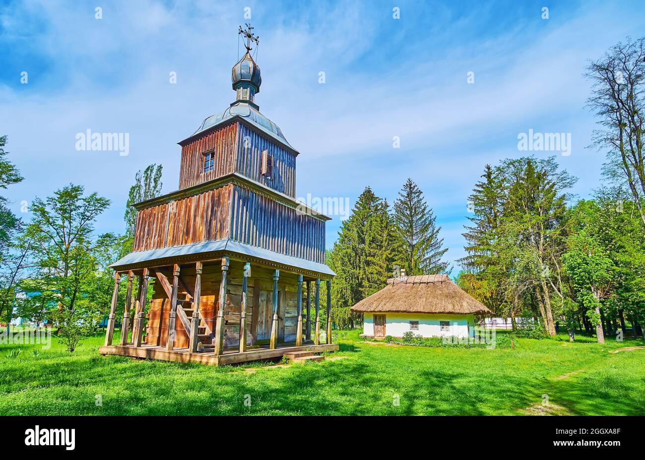 The tall timber belfry of Intercession Church with small porch, ladder ...