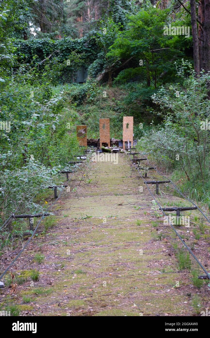 Shooting range in a summer forest under the open sky with targets in ...