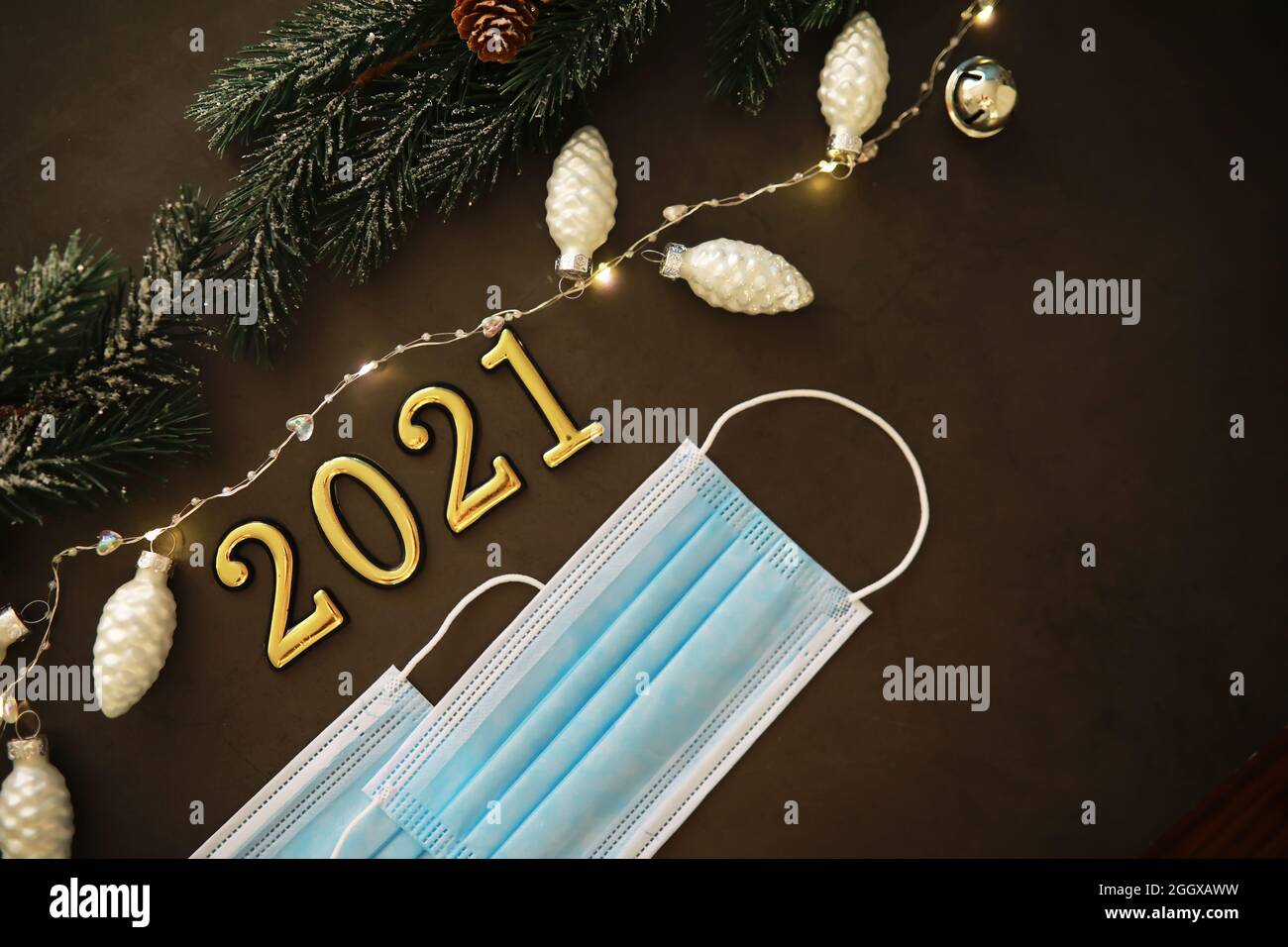 Medical protective masks on a Christmas background with Christmas ...