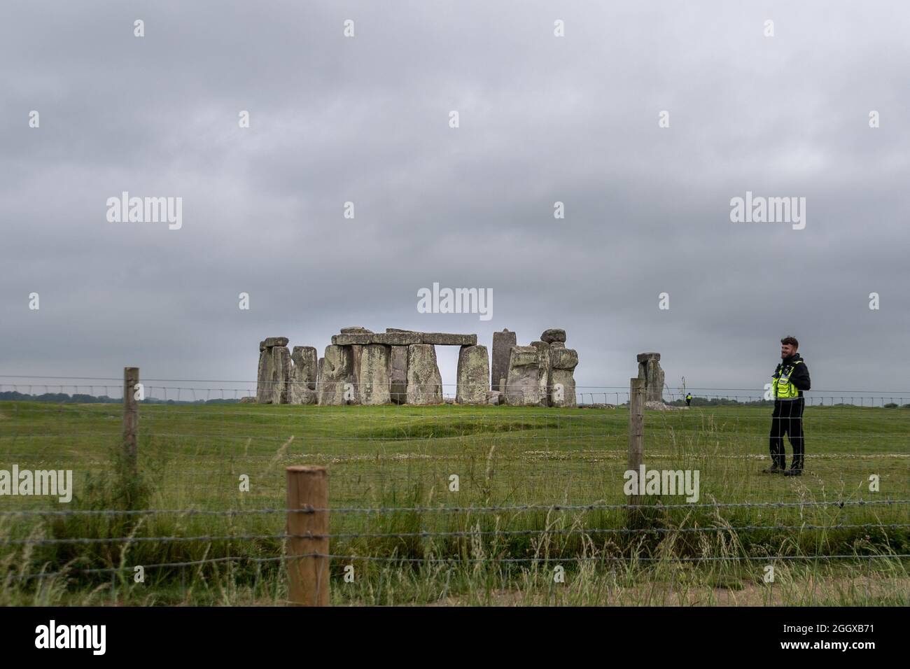 A security guard watching over the stones of Stonehenge for the summer ...