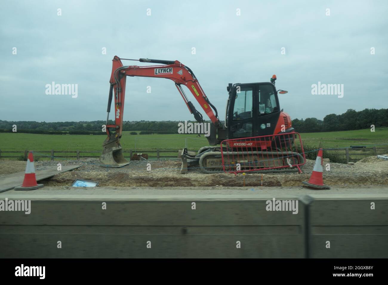 track cones cone builders building road works trees land worker lift ...