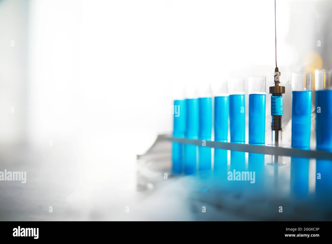 Test tube of glass overflows new liquid solution potassium blue ...