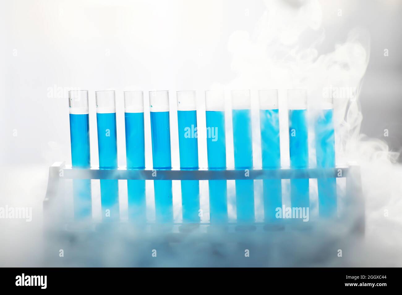 Test tube of glass overflows new liquid solution potassium blue ...