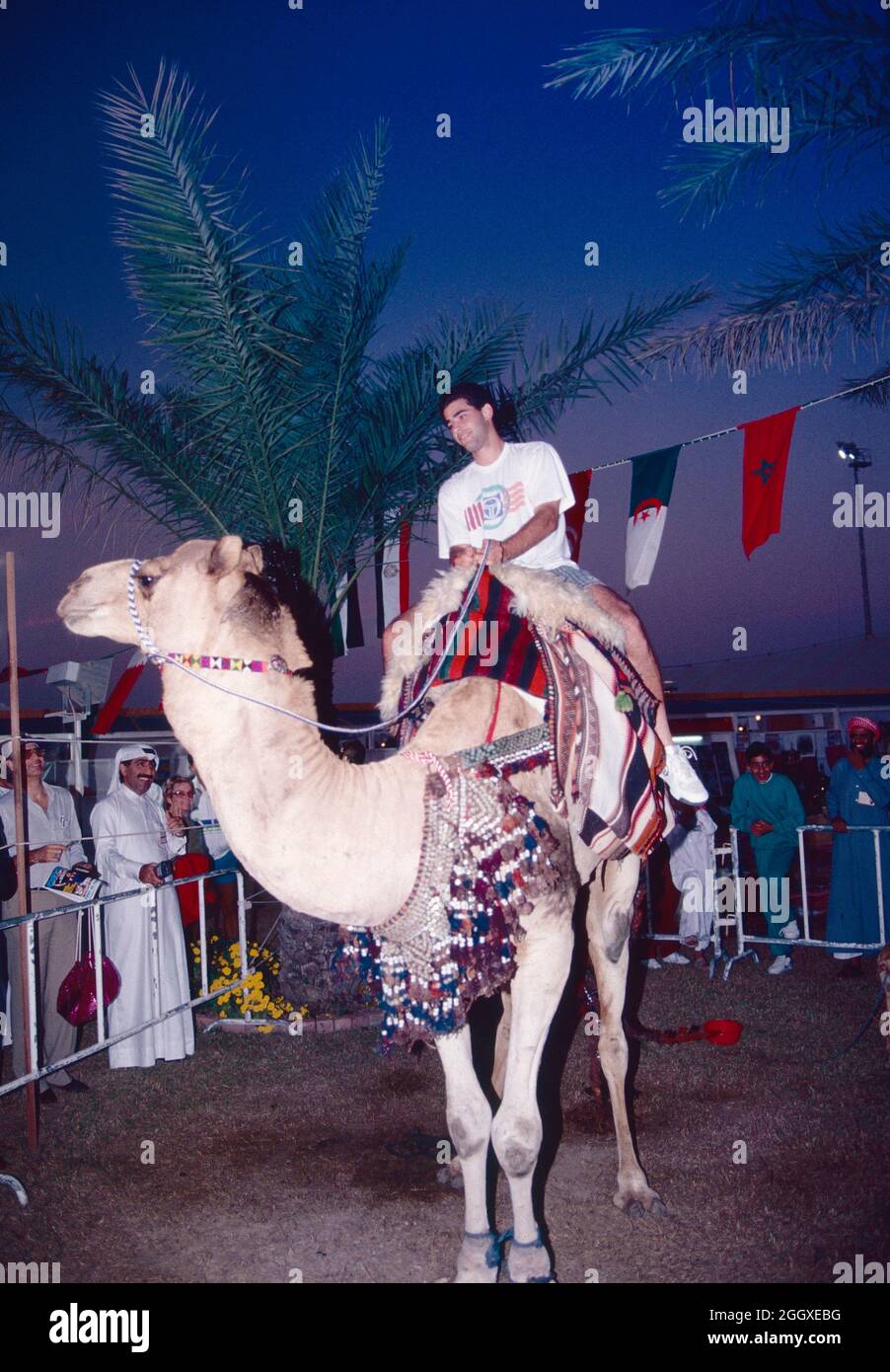 American tennis player Pete Sampras riding a camel, Qatar 1990s Stock ...