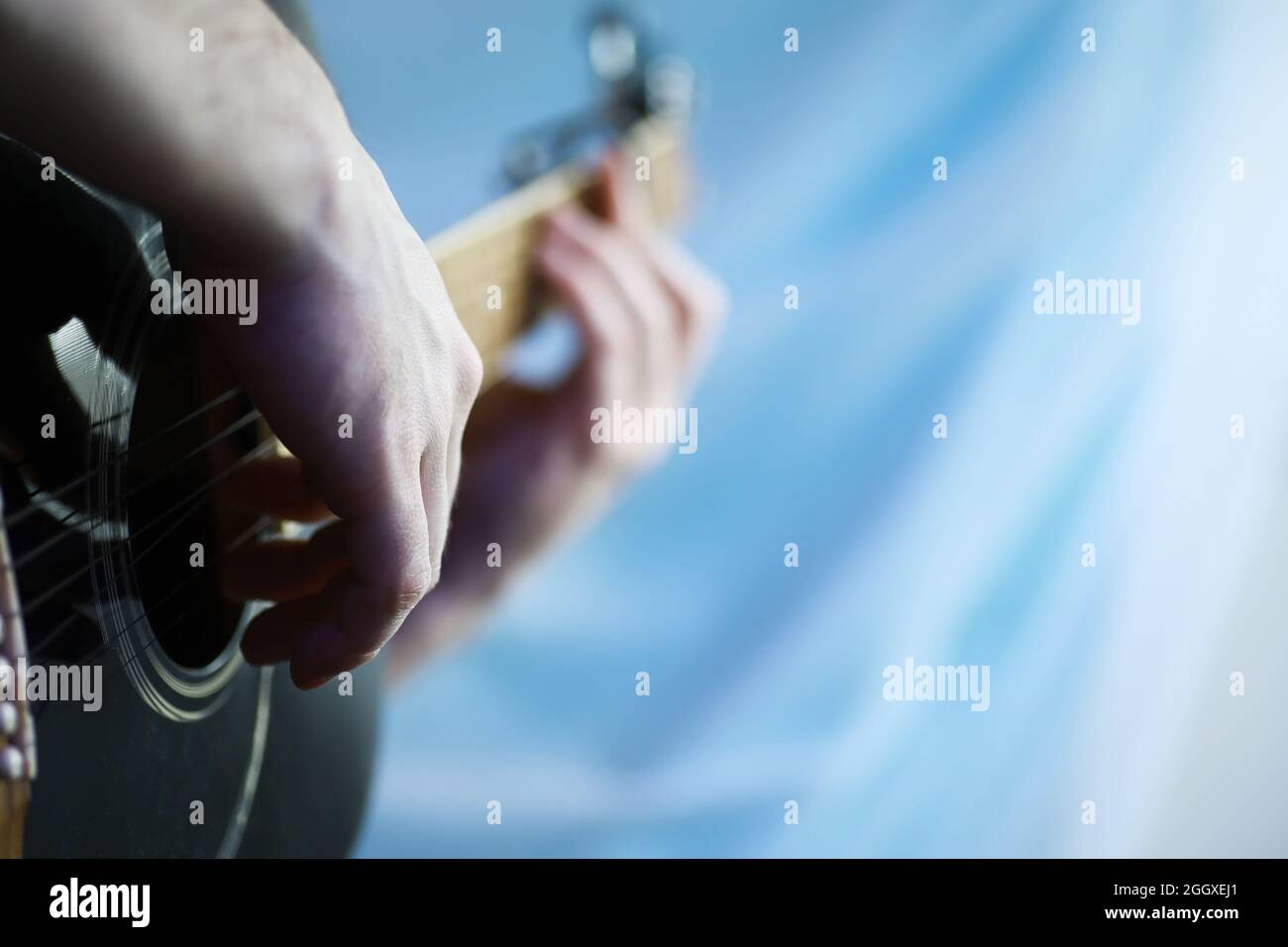 An acoustic guitar for artist playing a stringed musical instrument on ...