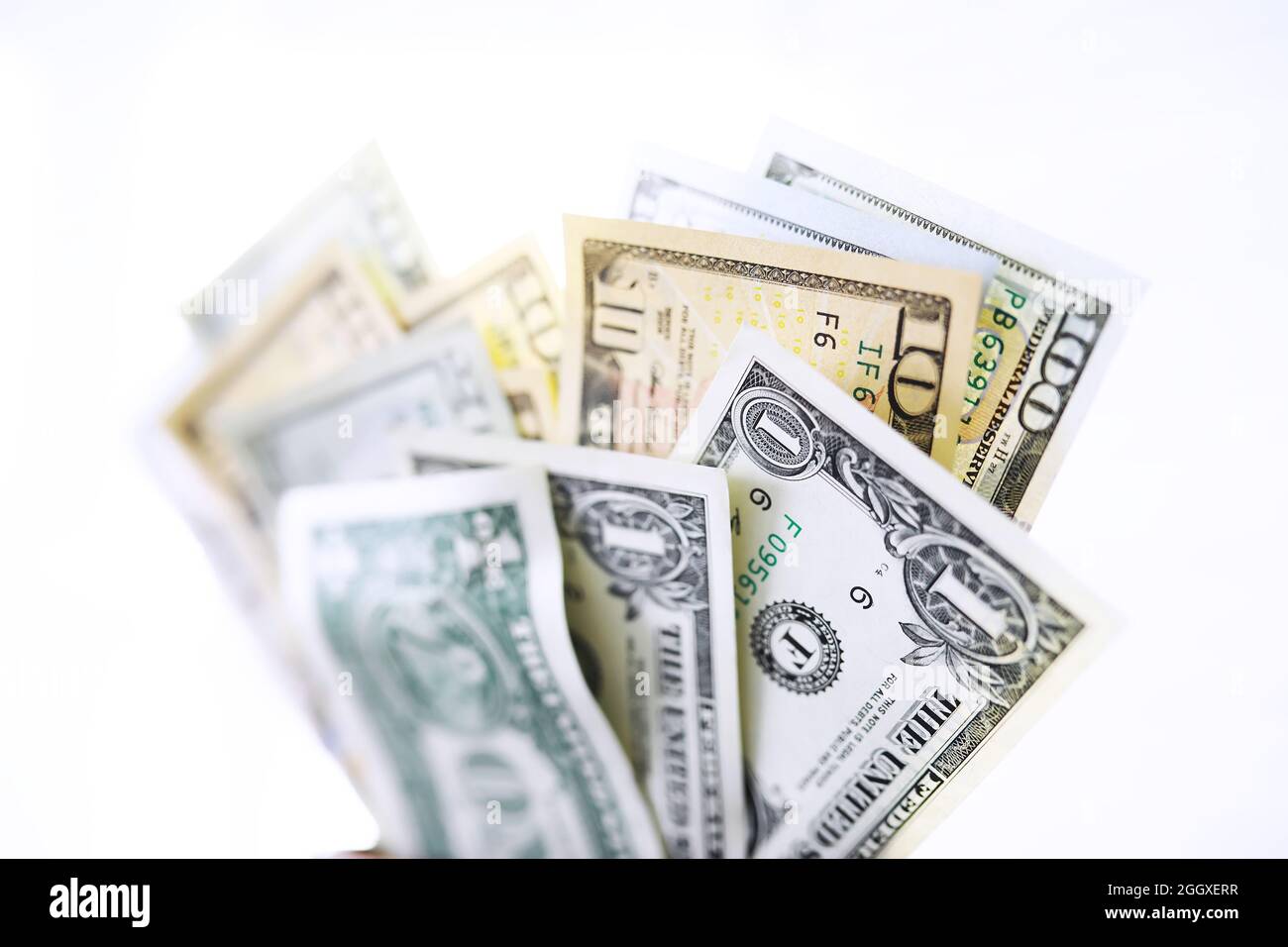 Cash money in a large pile as a finance background. Paper money close ...