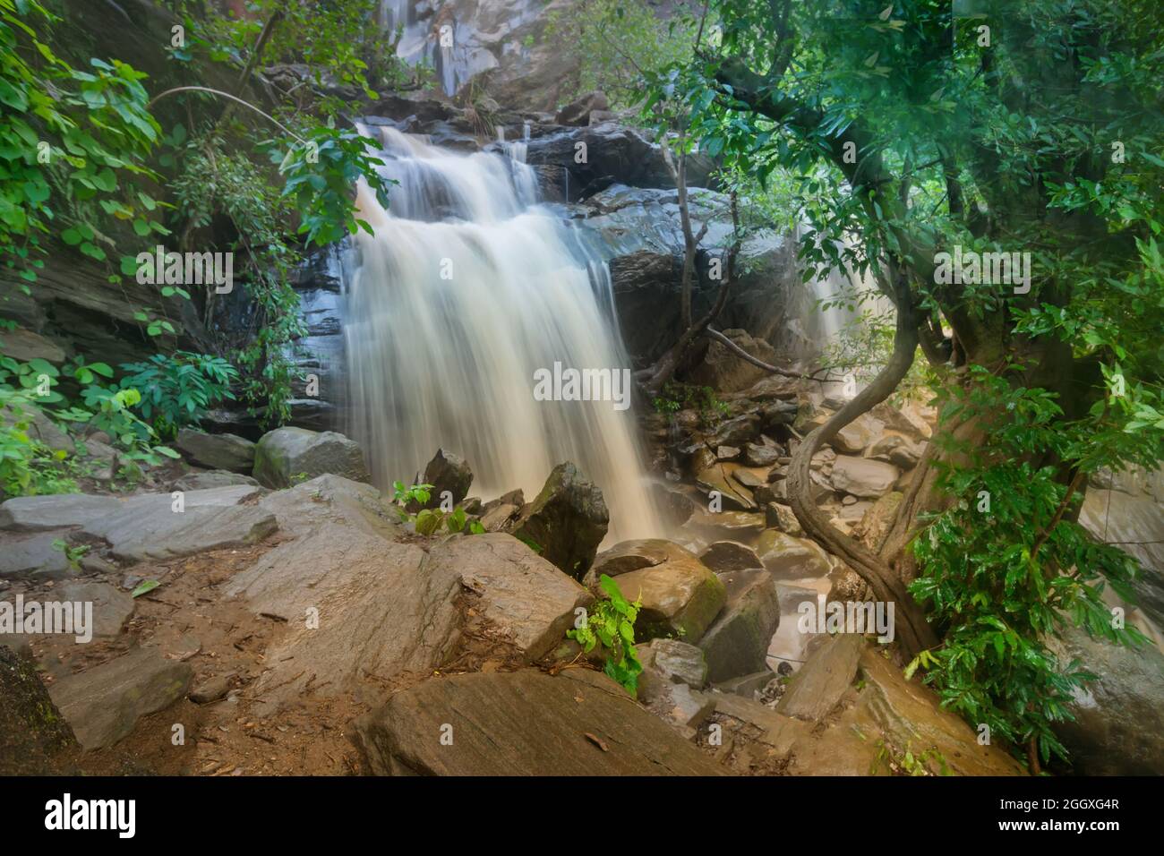 Beautiful Bamni waterfall having full streams of water flowing downhill ...