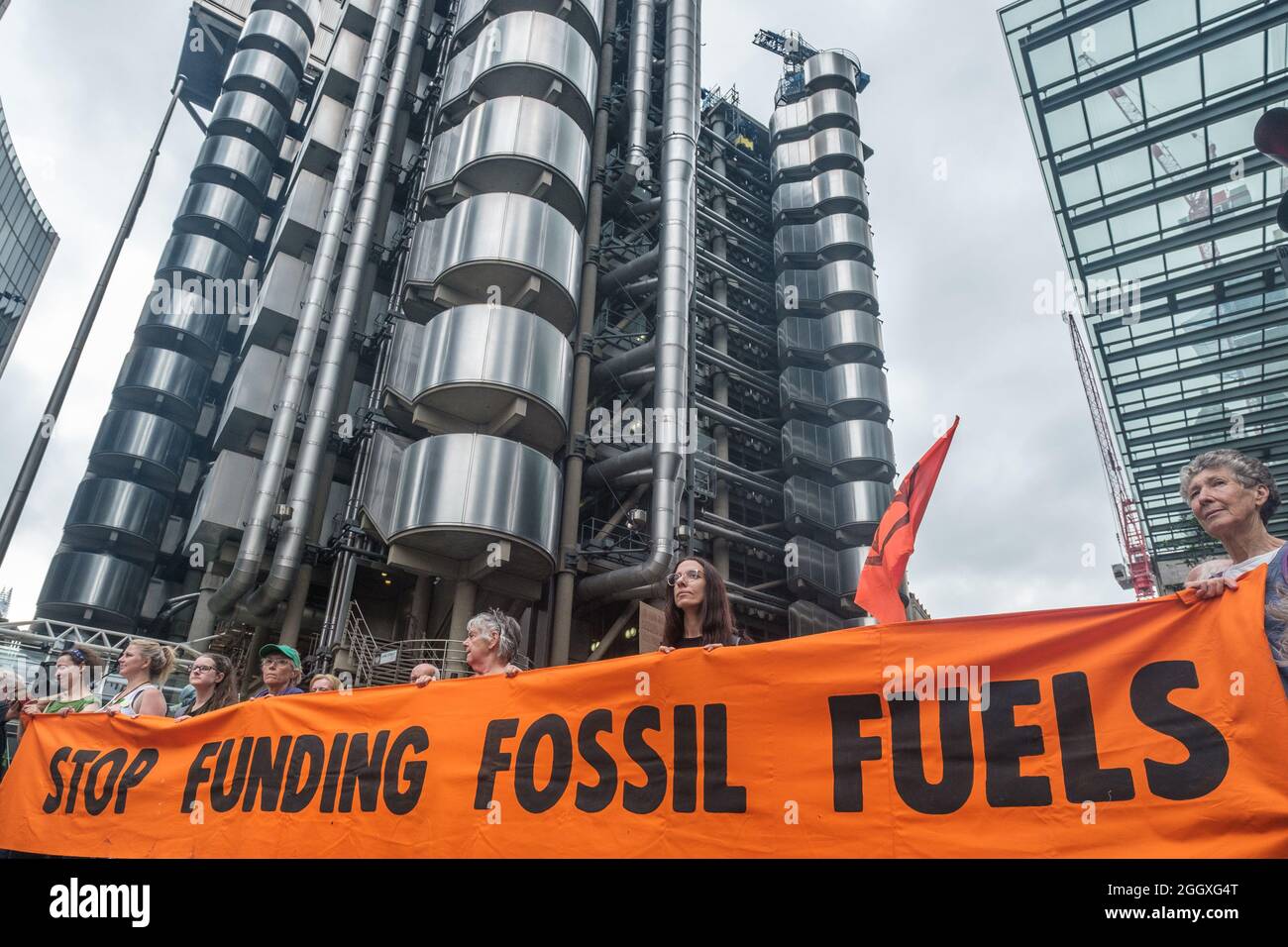 London, UK. 3rd Sep 2021. STOP FUNDING FOSSIL FUELS banner in front of Lloyds building. The ...