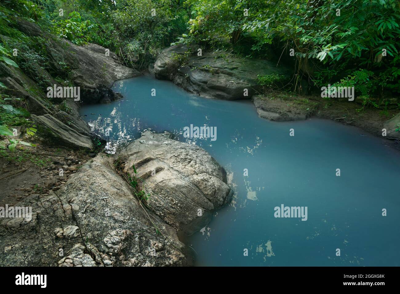 Beautiful Bamni waterfall having full streams of water flowing downhill ...