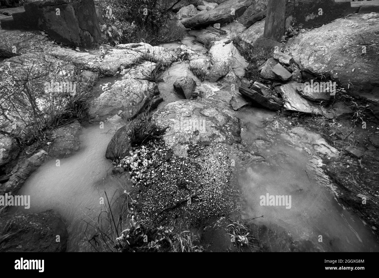 Beautiful Bamni waterfall having full streams of water flowing downhill ...
