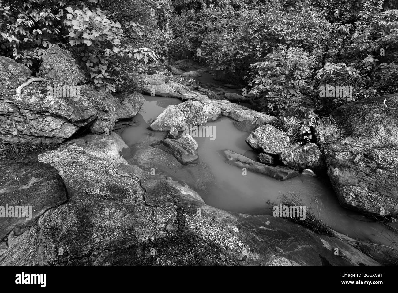 Beautiful Bamni waterfall having full streams of water flowing downhill ...