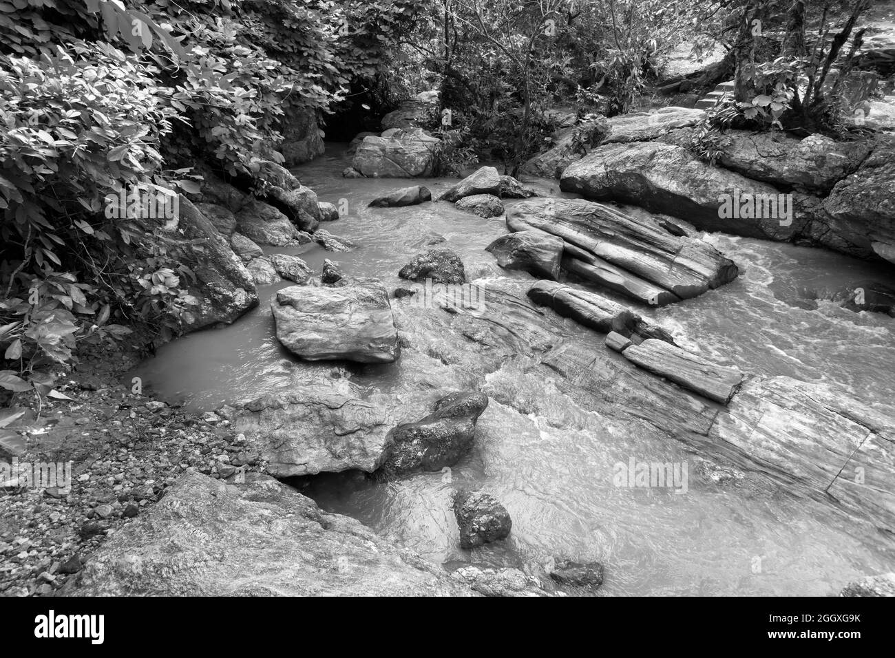Beautiful Bamni waterfall having full streams of water flowing downhill ...