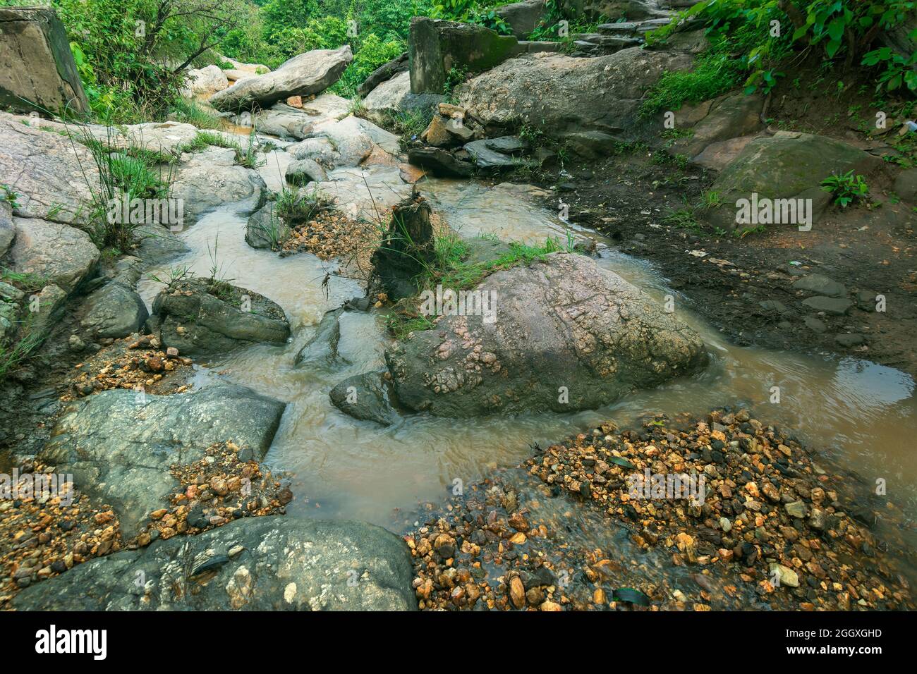 Beautiful Bamni waterfall having full streams of water flowing downhill ...