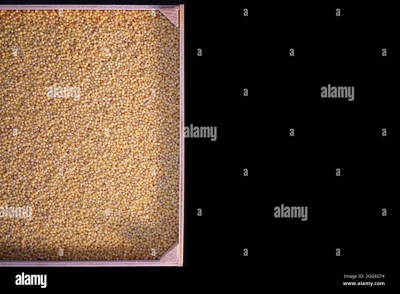 A set of grain cereals. Rice, buckwheat and millet groats in wooden ...