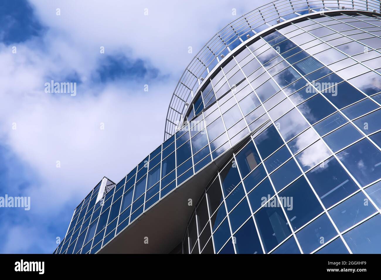 Architectural detail of the facade with multiple reflections of other ...