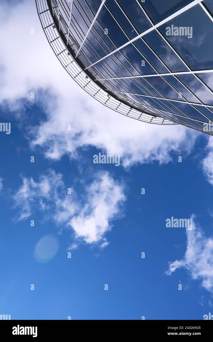 Architectural detail of the facade with multiple reflections of other ...