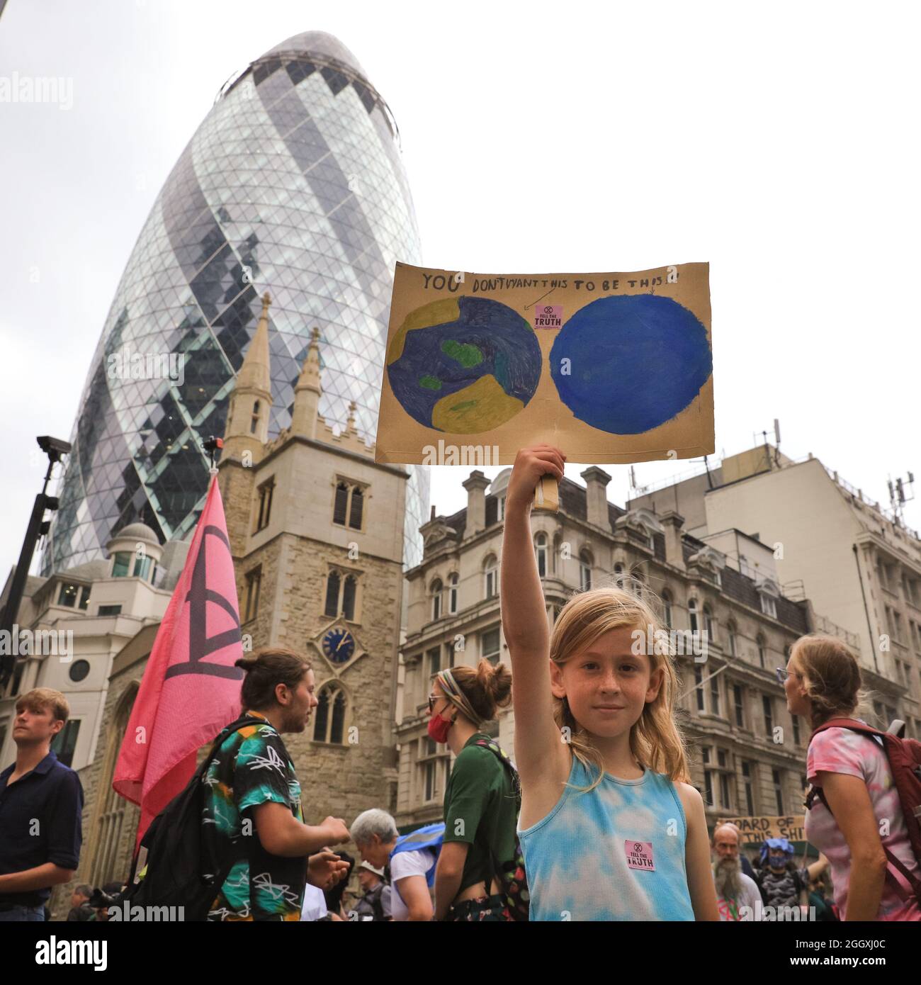 London, UK. 3rd Sep, 2021. A young protester with her hand painted ...