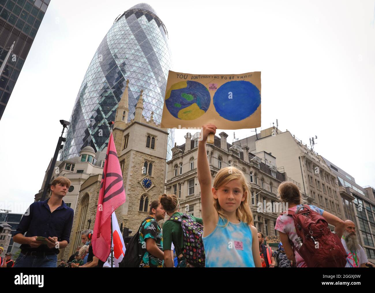 London, UK. 3rd Sep, 2021. A young protester with her hand painted ...