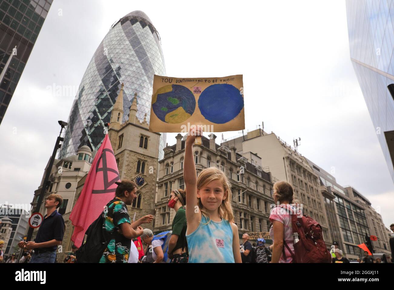 London, UK. 3rd Sep, 2021. A young protester with her hand painted ...