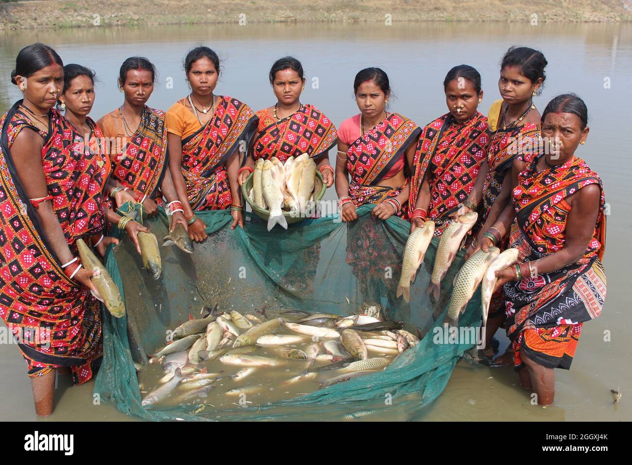 NEW DELHI, INDIA - Mar 25, 2020: A view of happy women fish farmers of ...