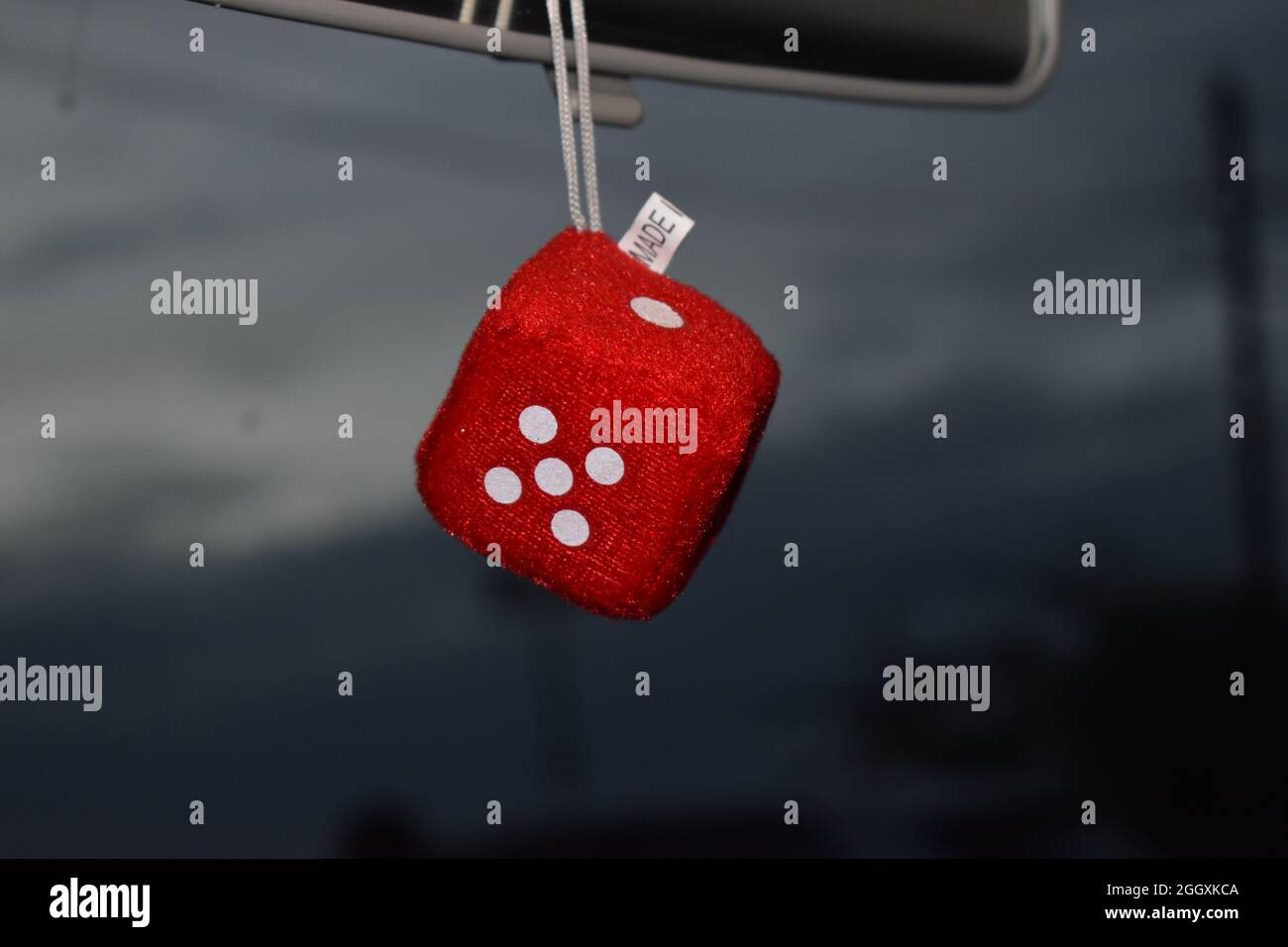 Dice hanging in car hi-res stock photography and images - Alamy