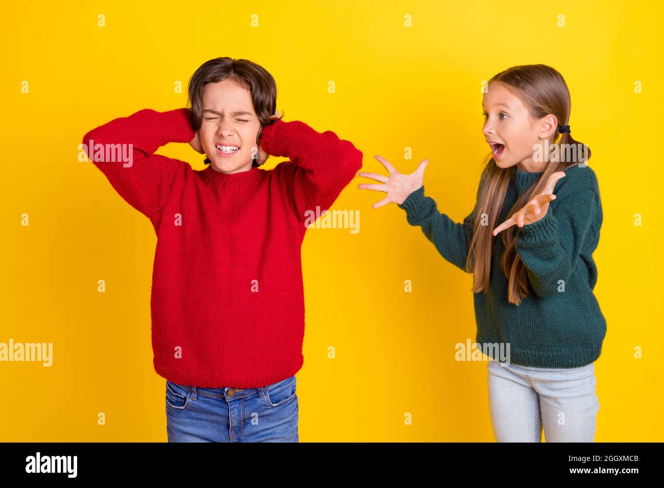 Photo portrait two children shouting arguing isolated bright yellow ...