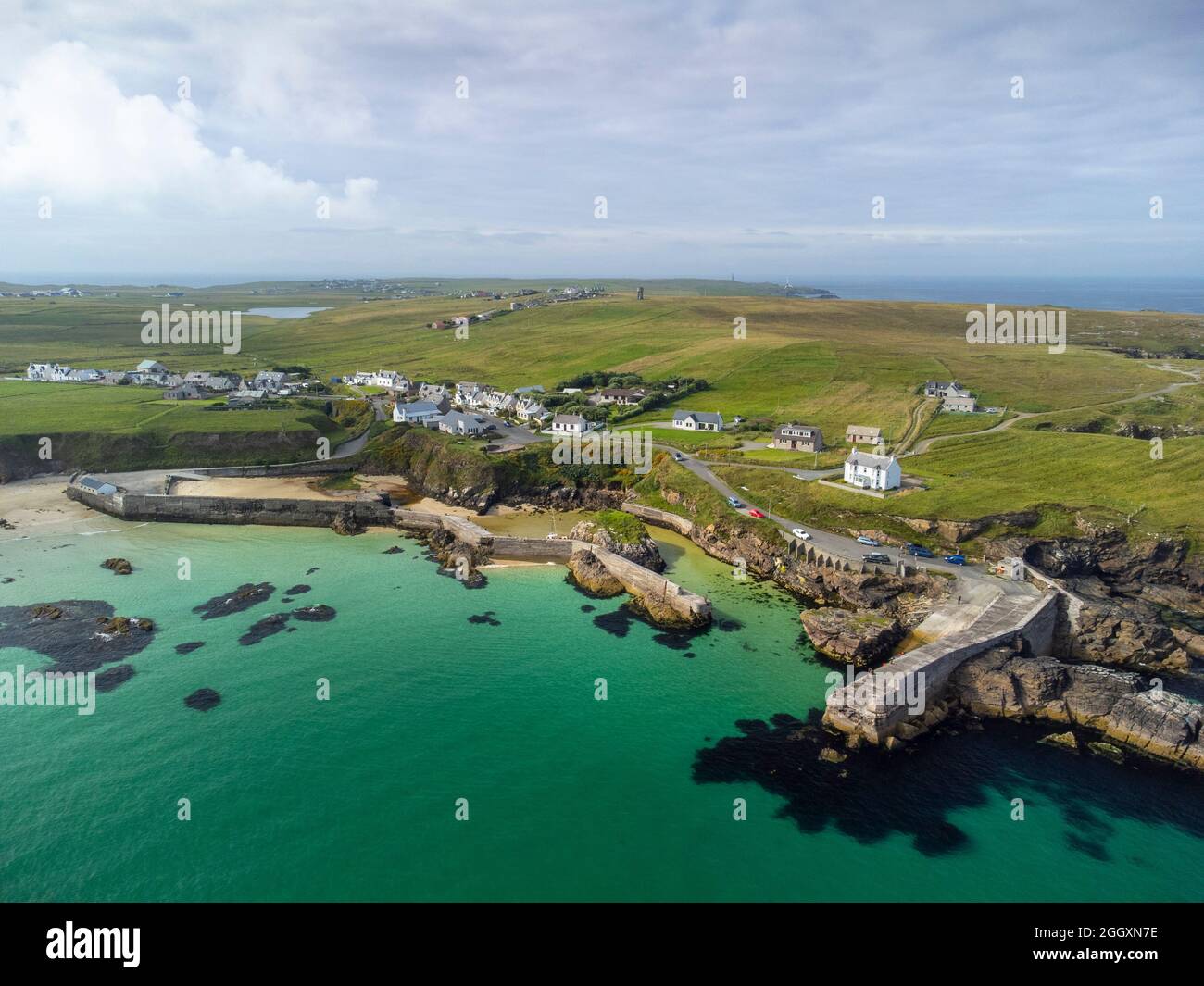 Aerial view from drone of village and harbour at Port Ness at northern ...